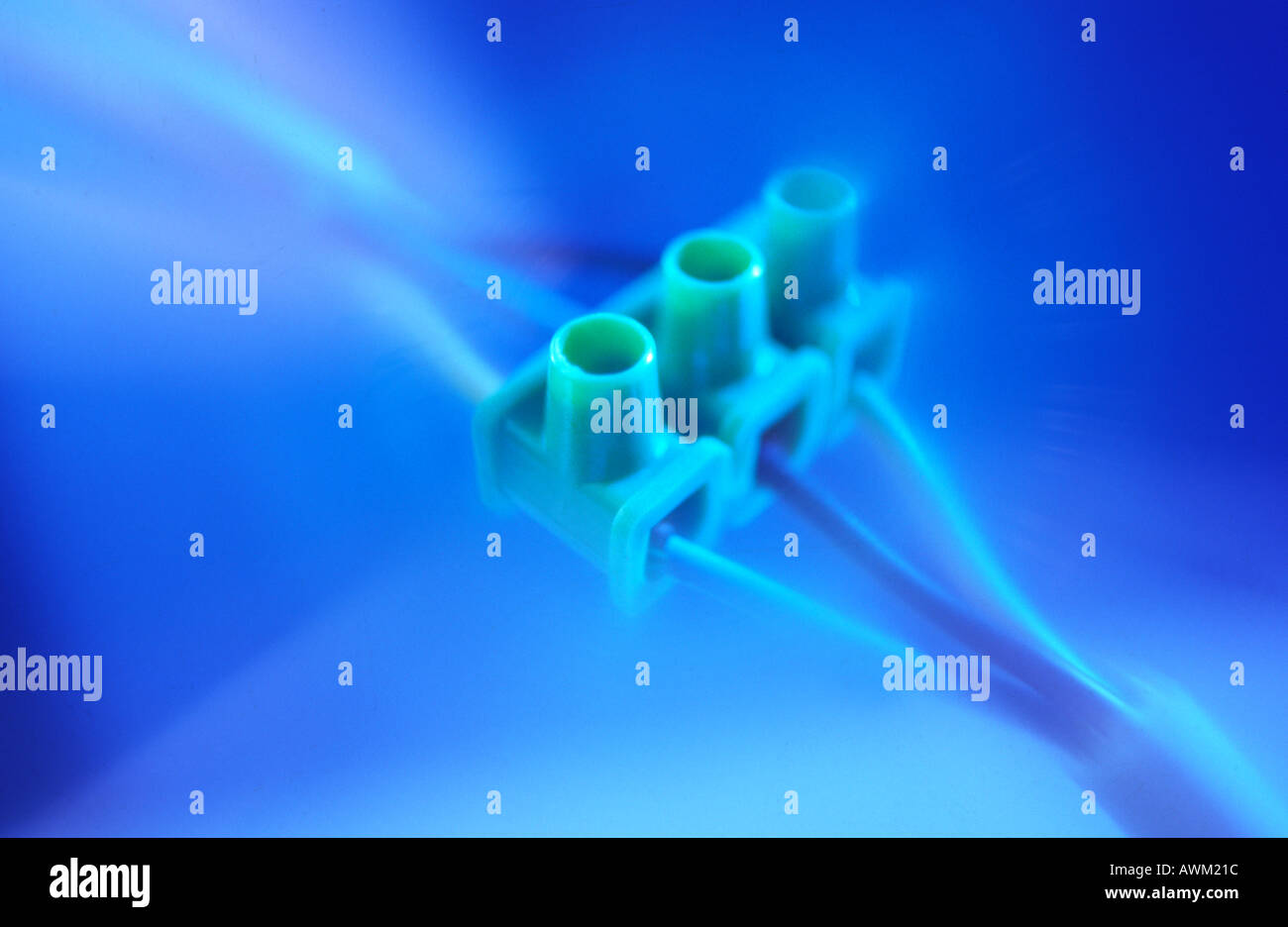 Two cables with exposed wires attached to connection block Stock Photo ...