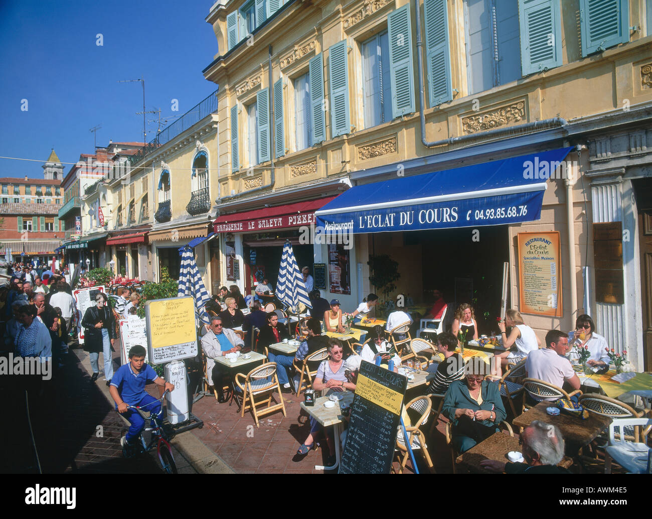 Tourists at sidewalk cafe, Nice, Provence-Alpes-Cote d'Azur, France ...