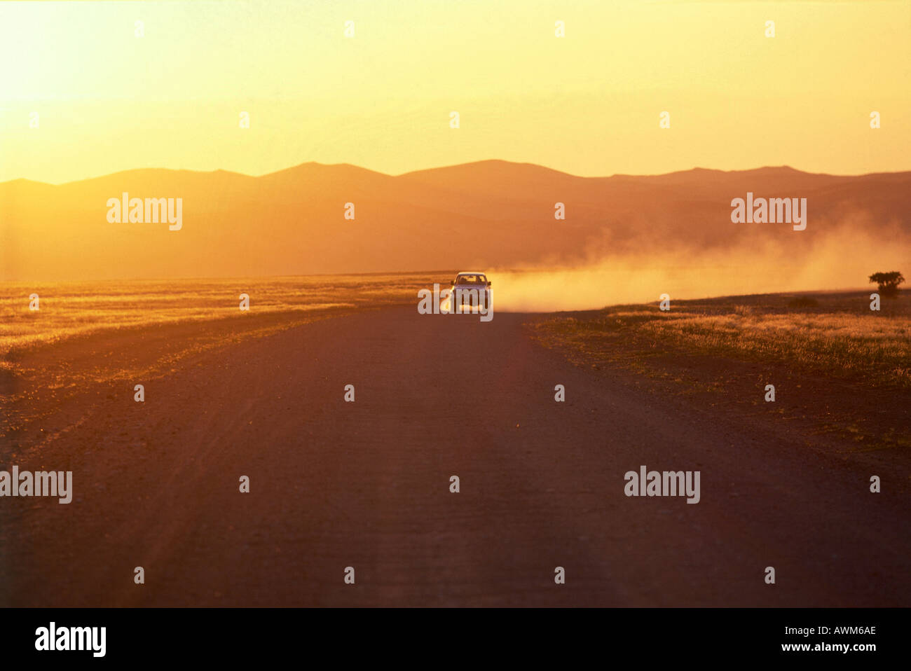 Car leaving dust cloud hi-res stock photography and images - Alamy