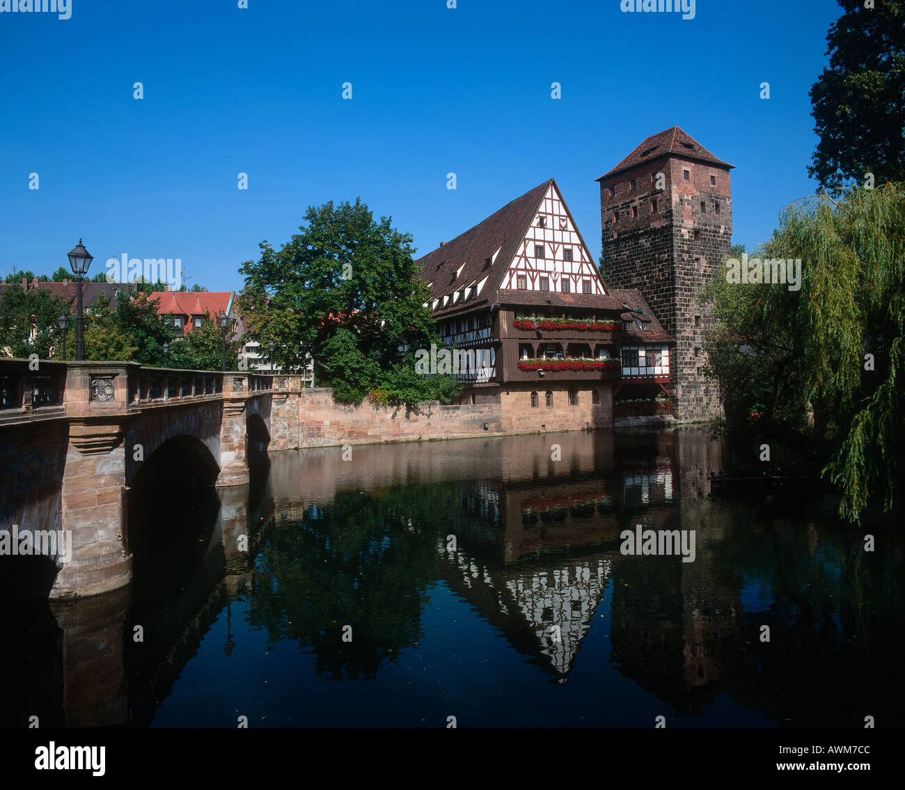 Bridge across river in town, River Pegnitz, Nuremberg, Bavaria, Germany ...