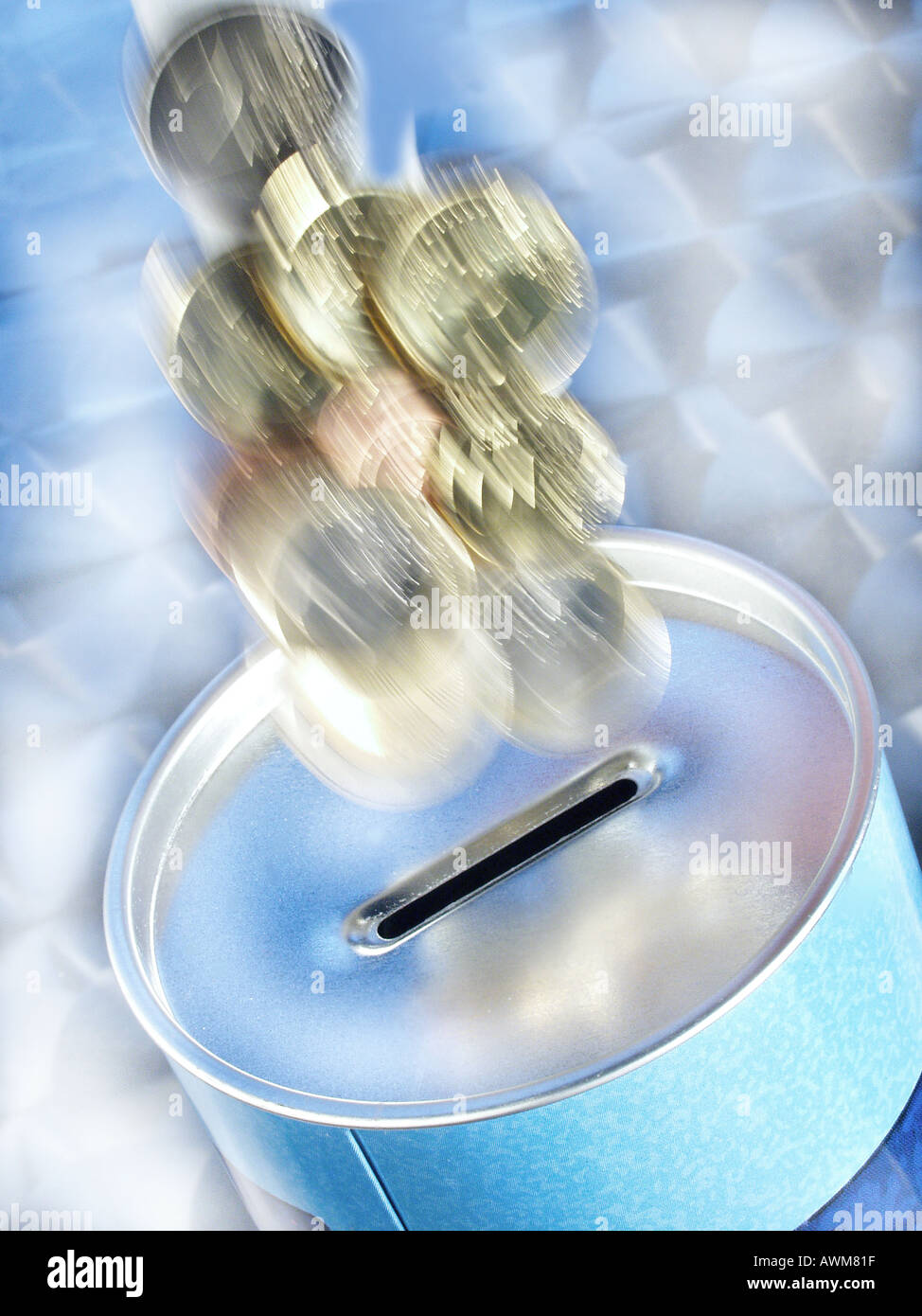 European Union coins falling into tin can money box Stock Photo - Alamy
