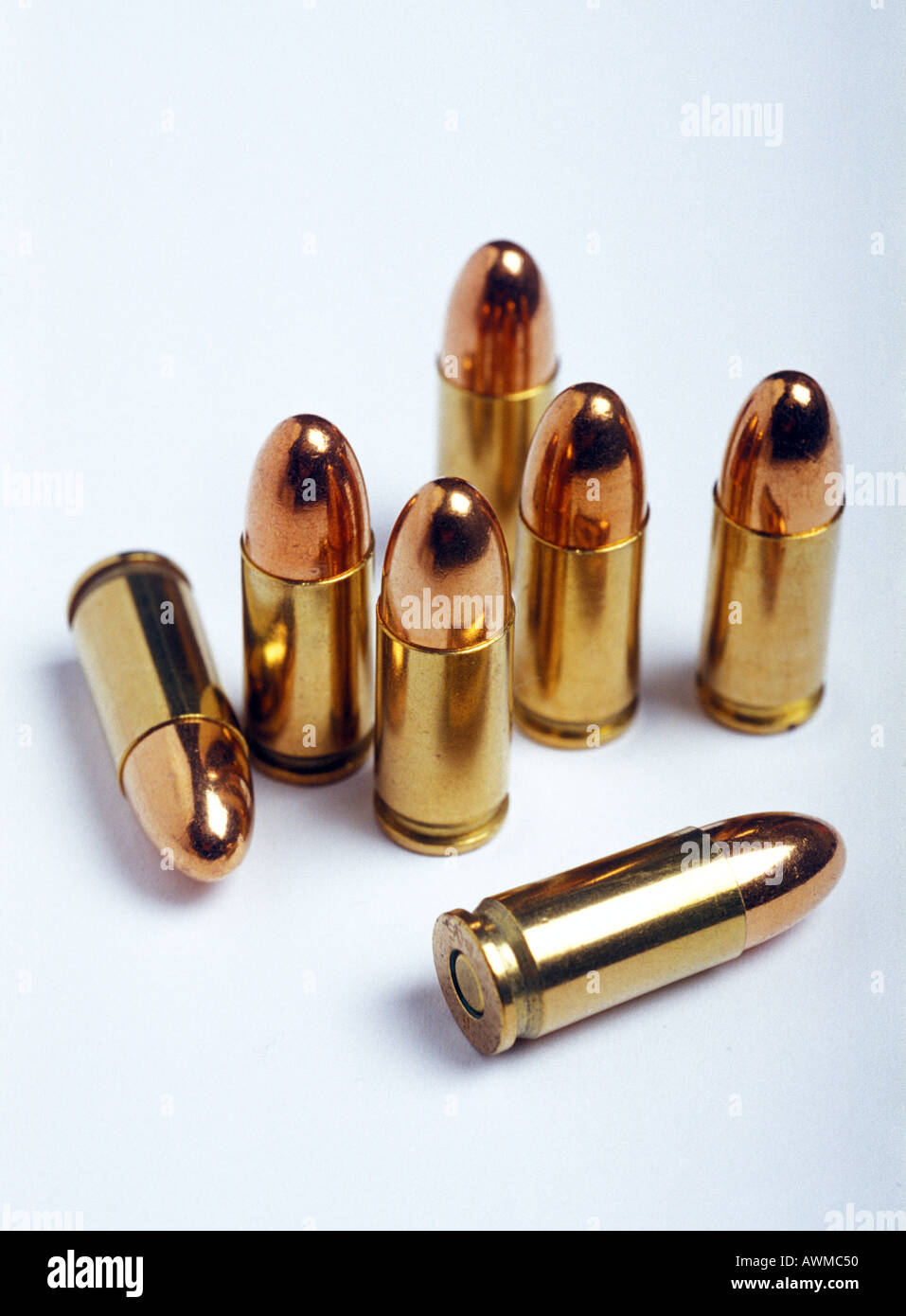 Close-up of bullets on white background Stock Photo - Alamy