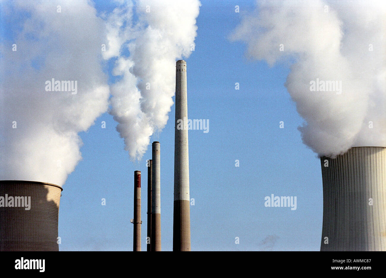 Smoke emitting from chimneys Stock Photo - Alamy