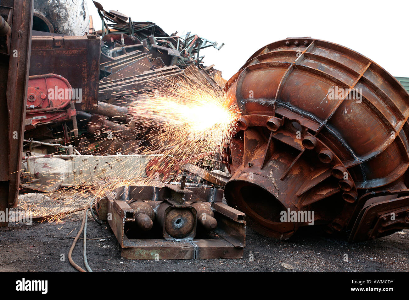 Welder on scrapyard Stock Photo - Alamy