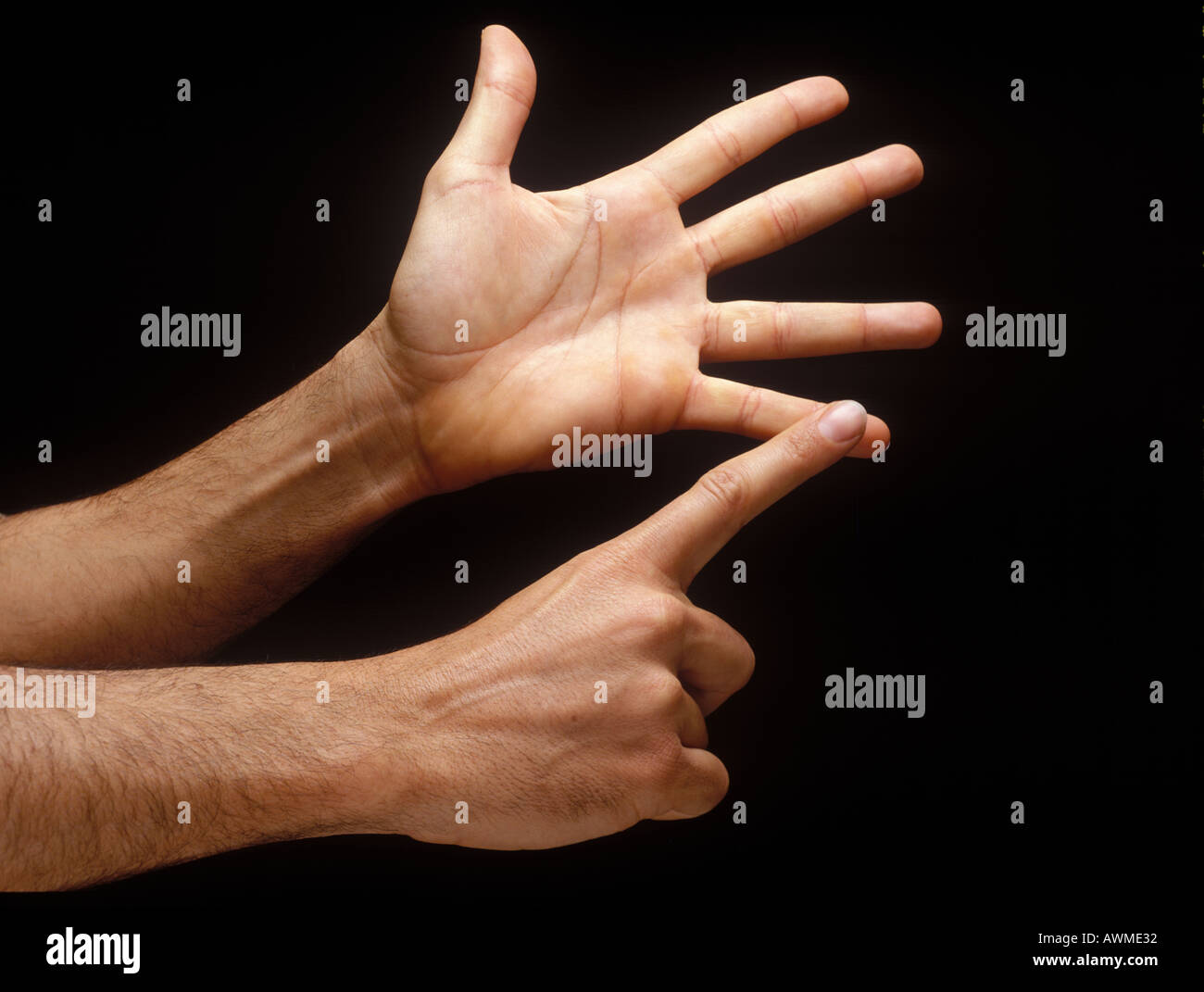 Close-up of man counting on his fingers Stock Photo - Alamy