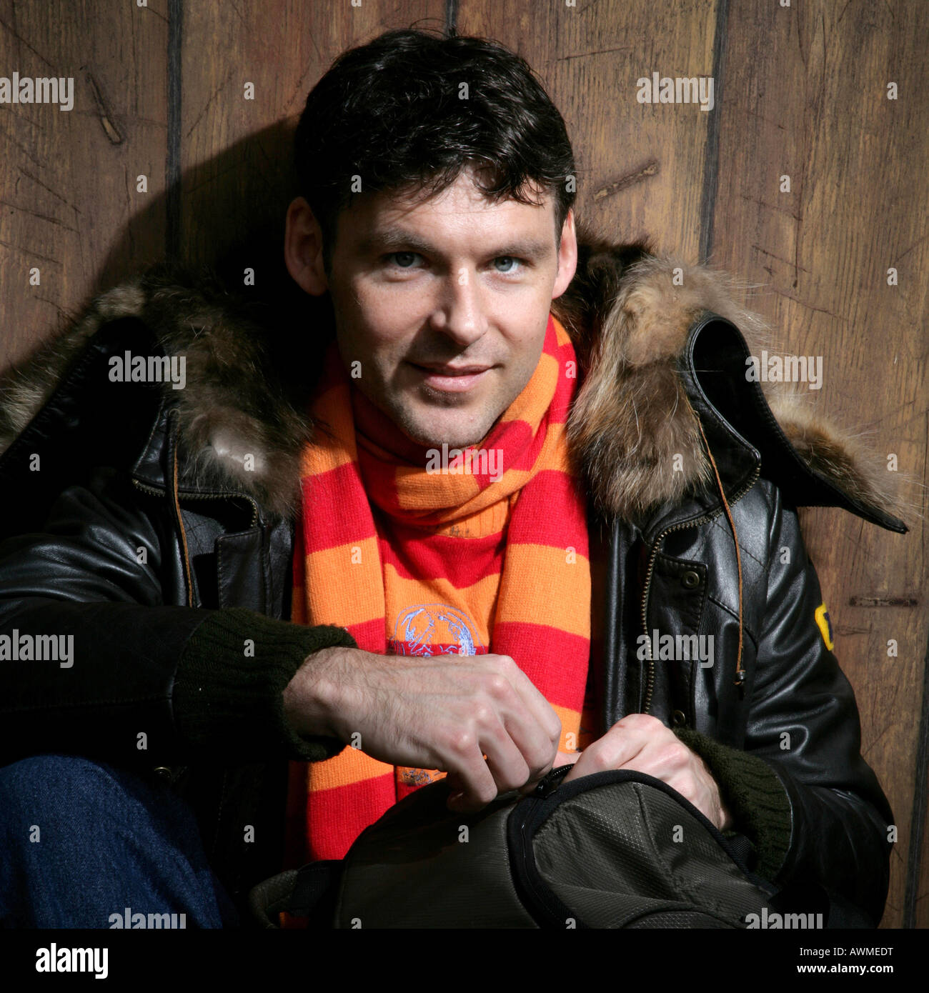 Young man wearing a scarf Stock Photo - Alamy