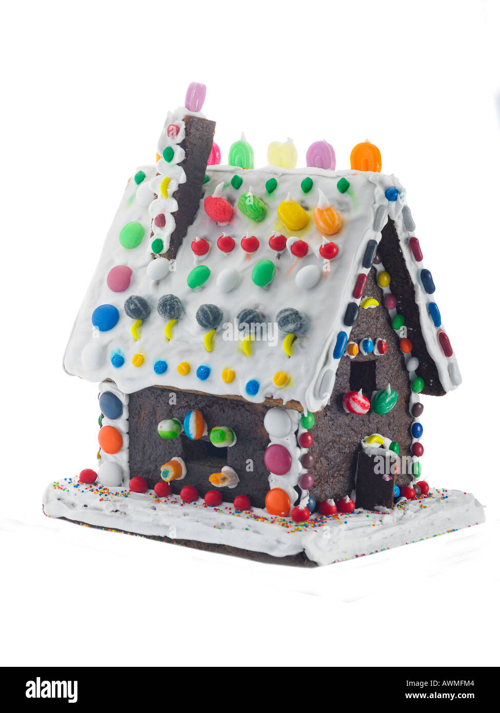 traditional ginger bread house covered in sweets and icing Stock Photo ...