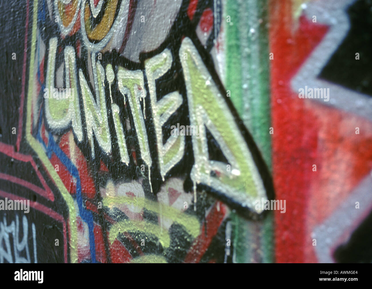Graffiti with word "united", close-up Stock Photo - Alamy