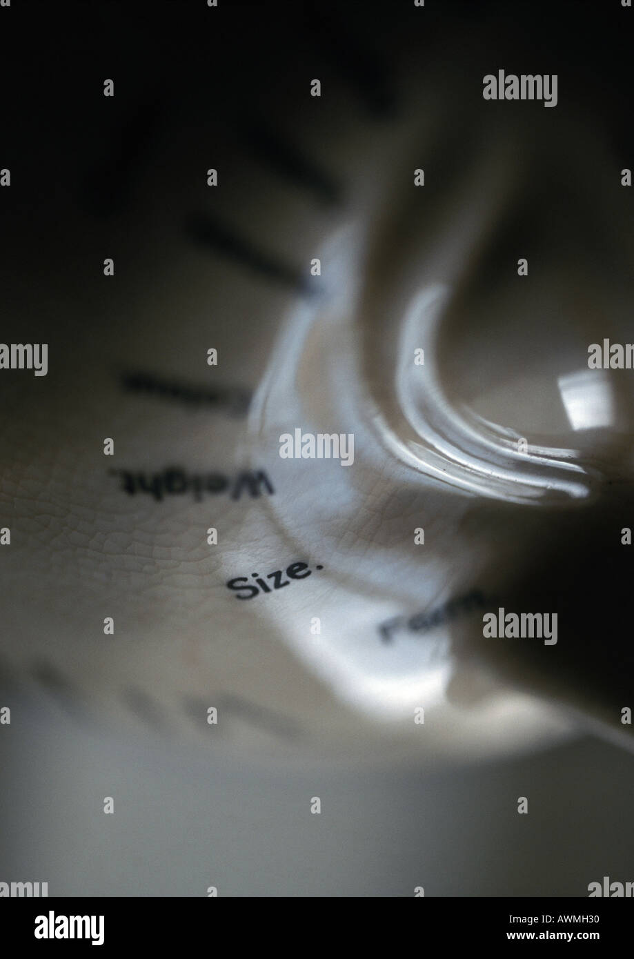 Size text printed on curved surface Stock Photo - Alamy