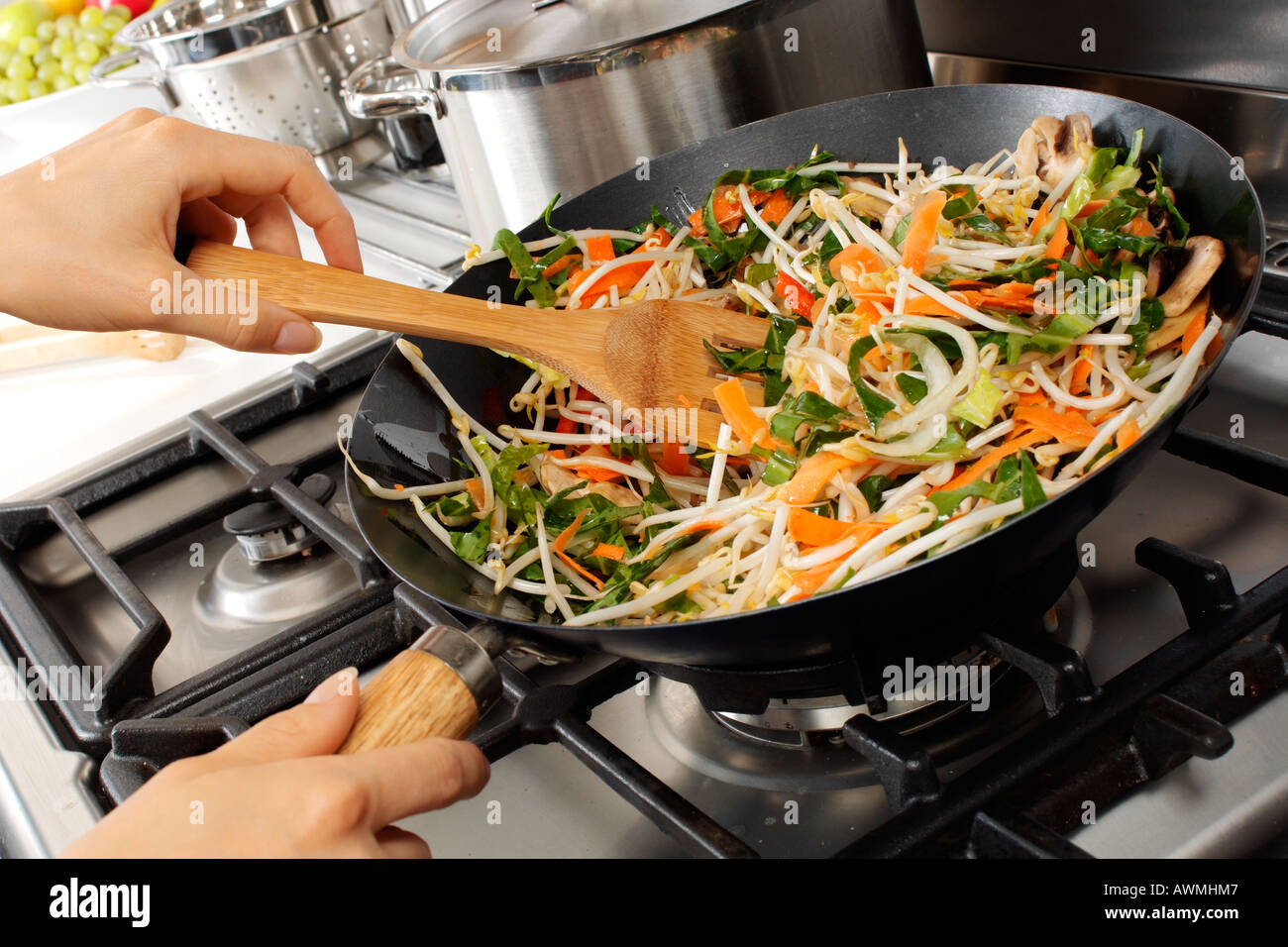 Stir frying hi-res stock photography and images - Alamy