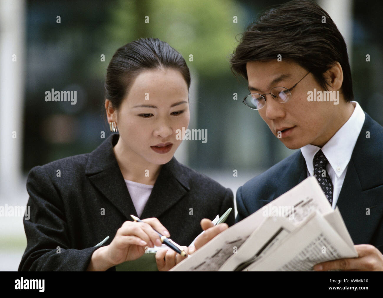 Woman pointing up info hi-res stock photography and images - Alamy