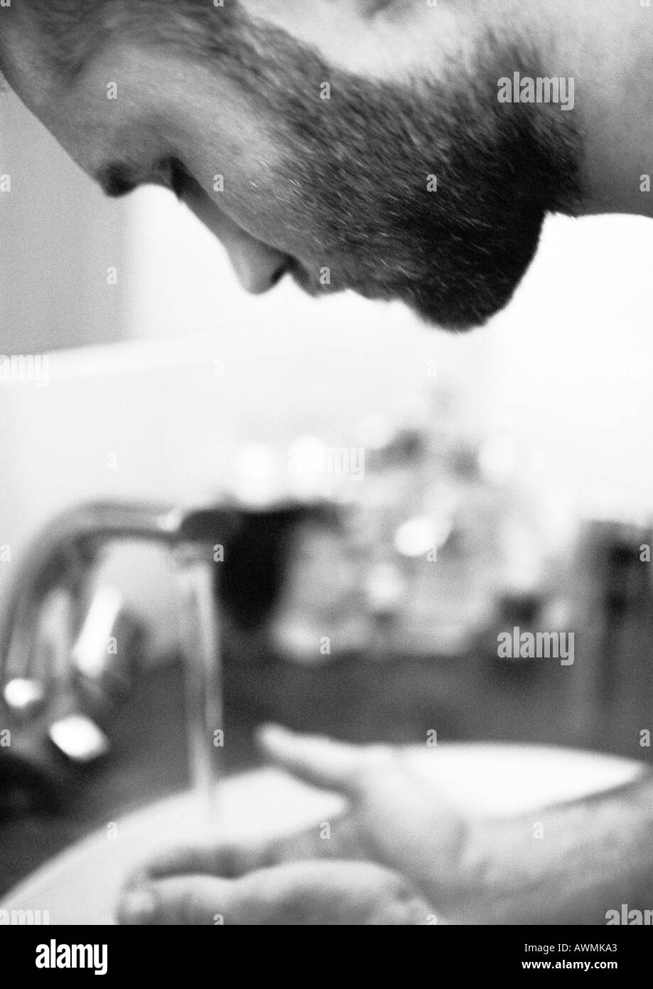 Hands under water Black and White Stock Photos & Images - Alamy