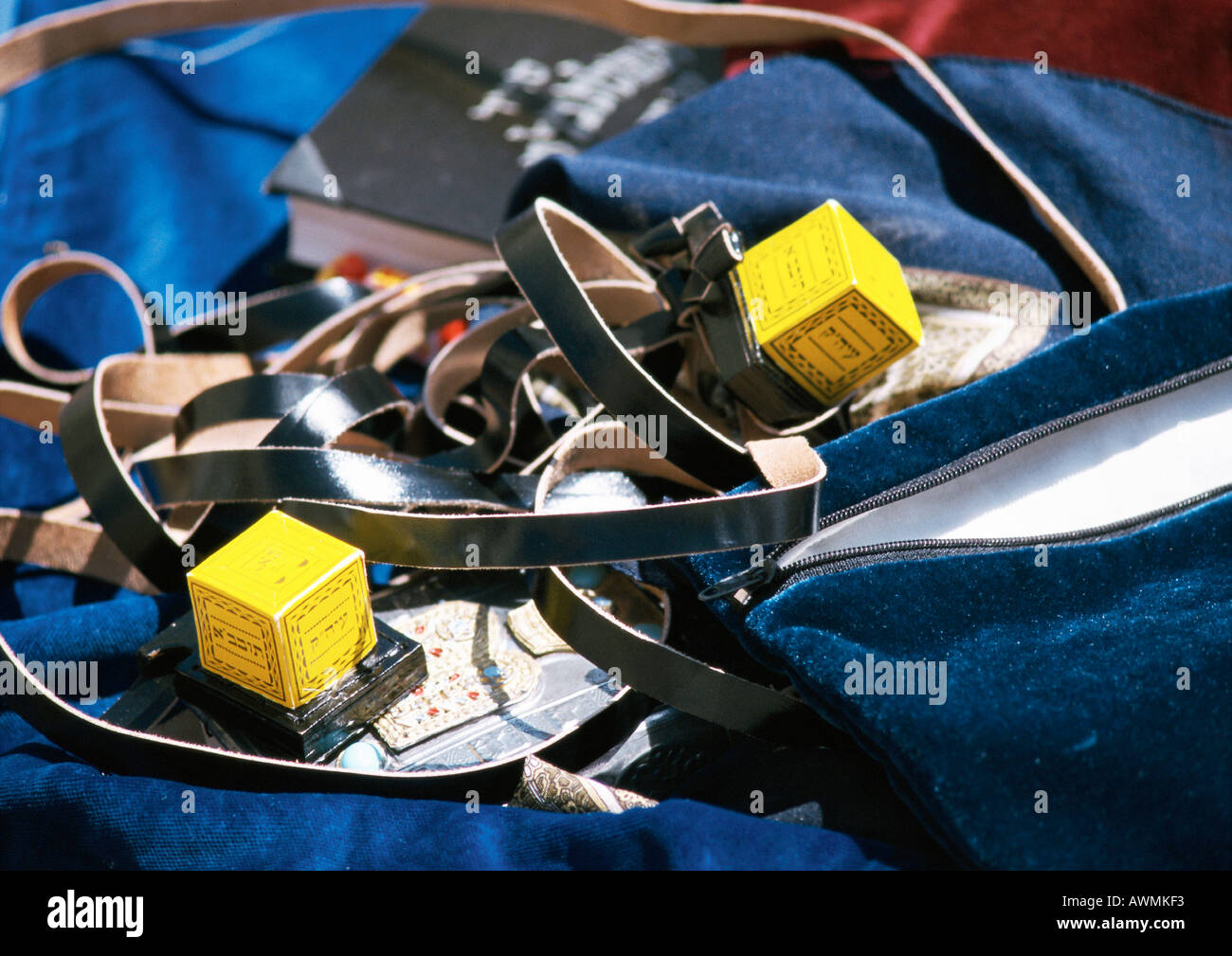 Tefillin (Jewish prayer objects consisting of leather straps and little ...
