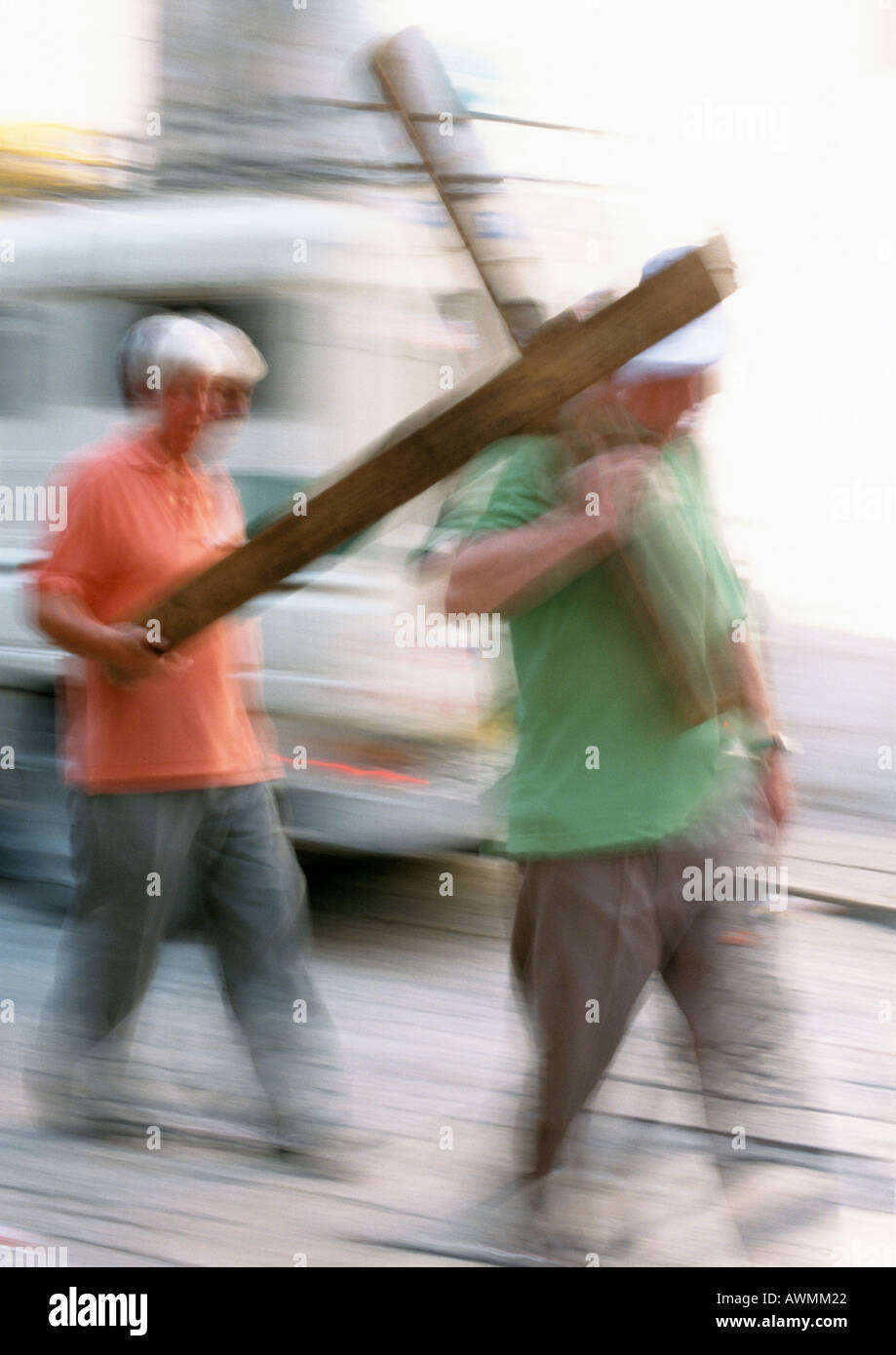 Two men carrying wooden cross hi-res stock photography and images - Alamy