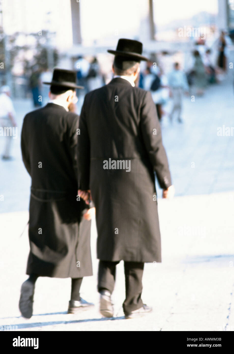 Israel, Jerusalem, Orthodox Jews walking in street, rear view Stock ...