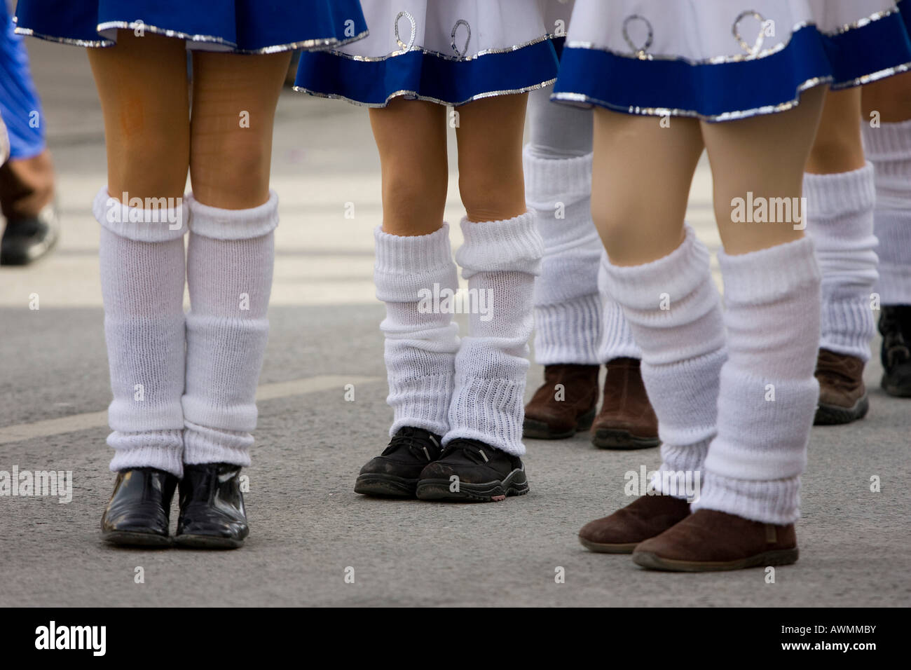 Girls' legs, dancers taking part in a carnival (Mardi Gras) parade in ... Girls' legs, dancers taking part in a carnival (Mardi Gras) parade in ...