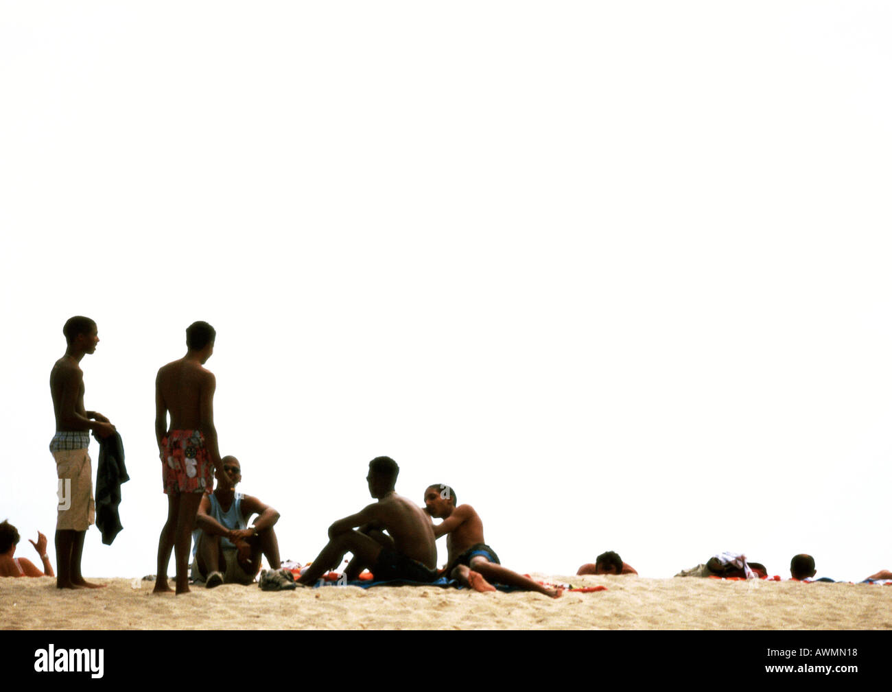 Group of people on beach Stock Photo - Alamy