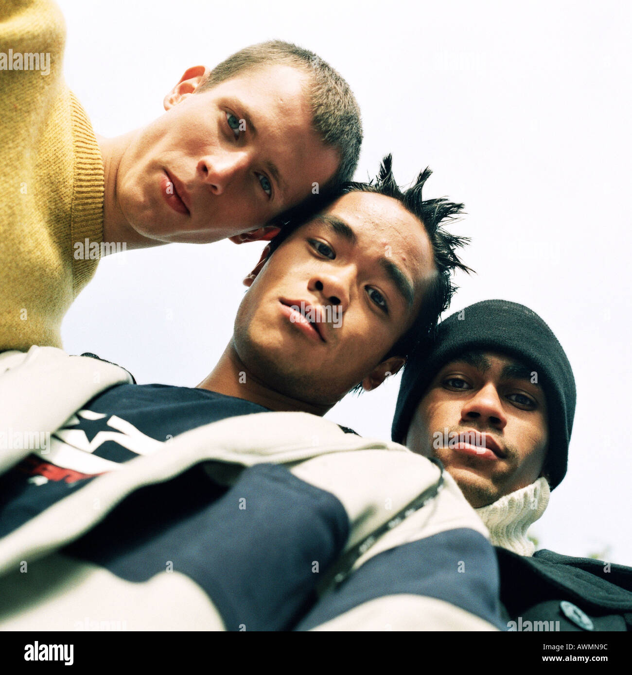 Three young men staring camera hi-res stock photography and images - Alamy