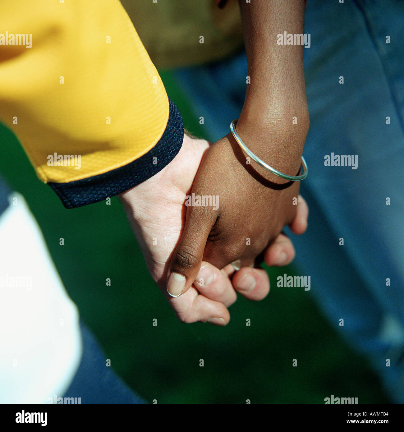 Kids clasped hands hi-res stock photography and images - Alamy