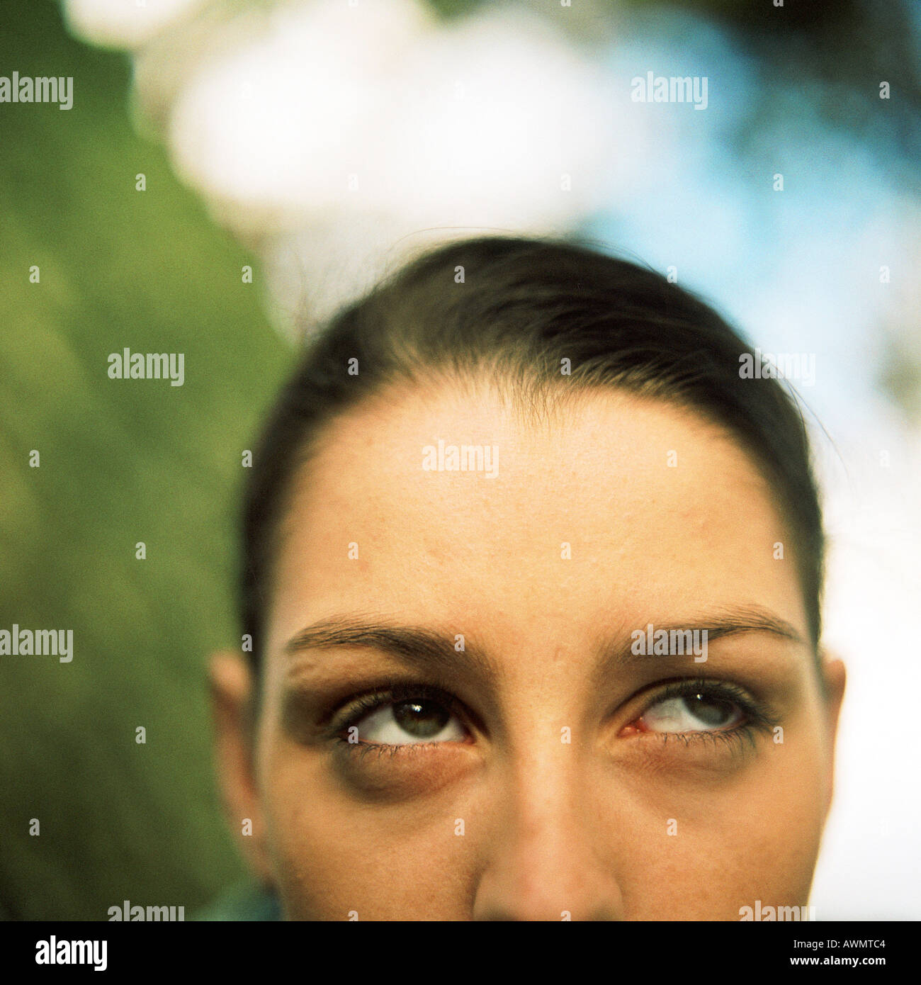 Partial view of woman's face looking up, close up, portrait Stock Photo ...
