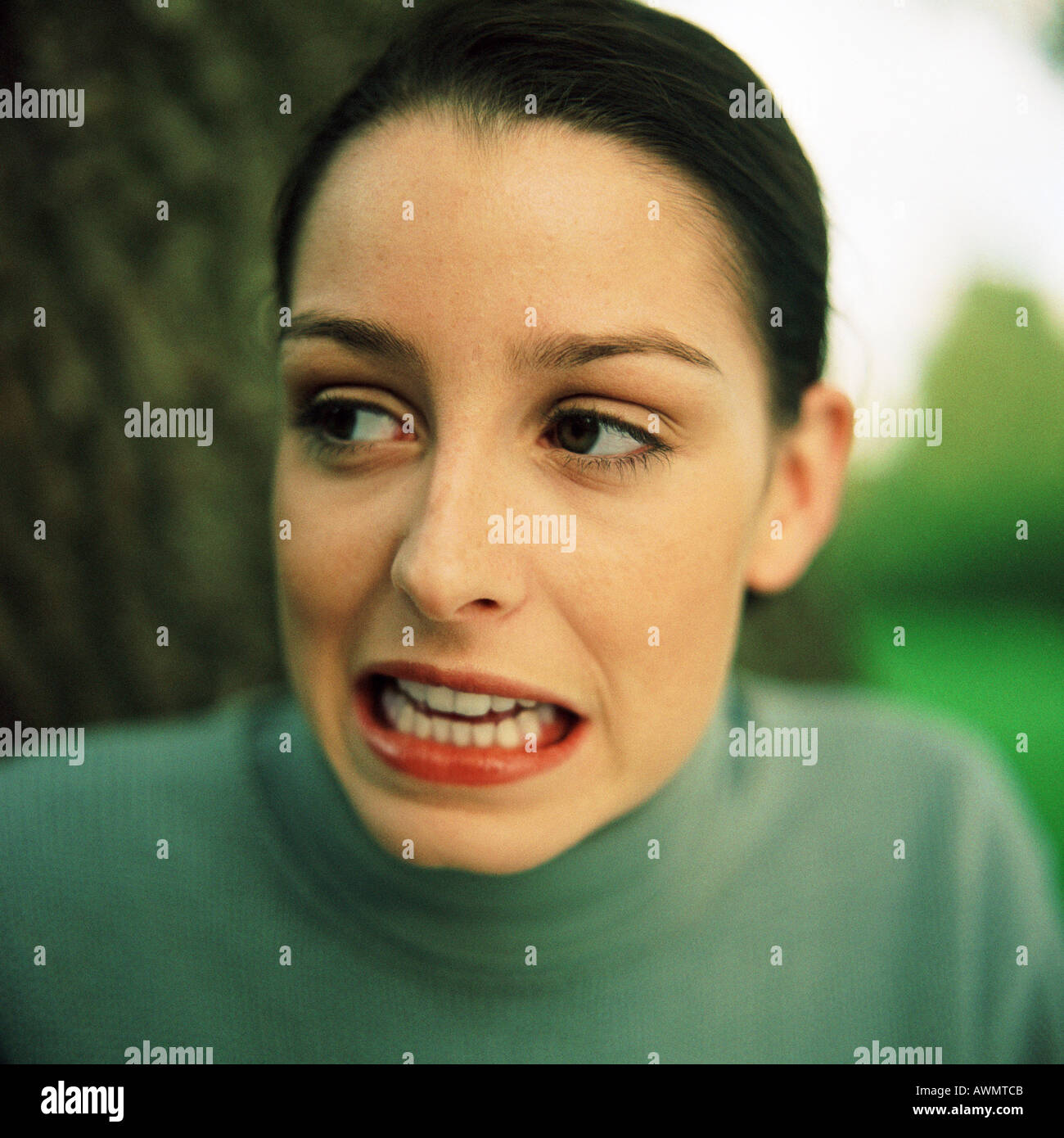Young woman making face, close-up, portrait Stock Photo - Alamy