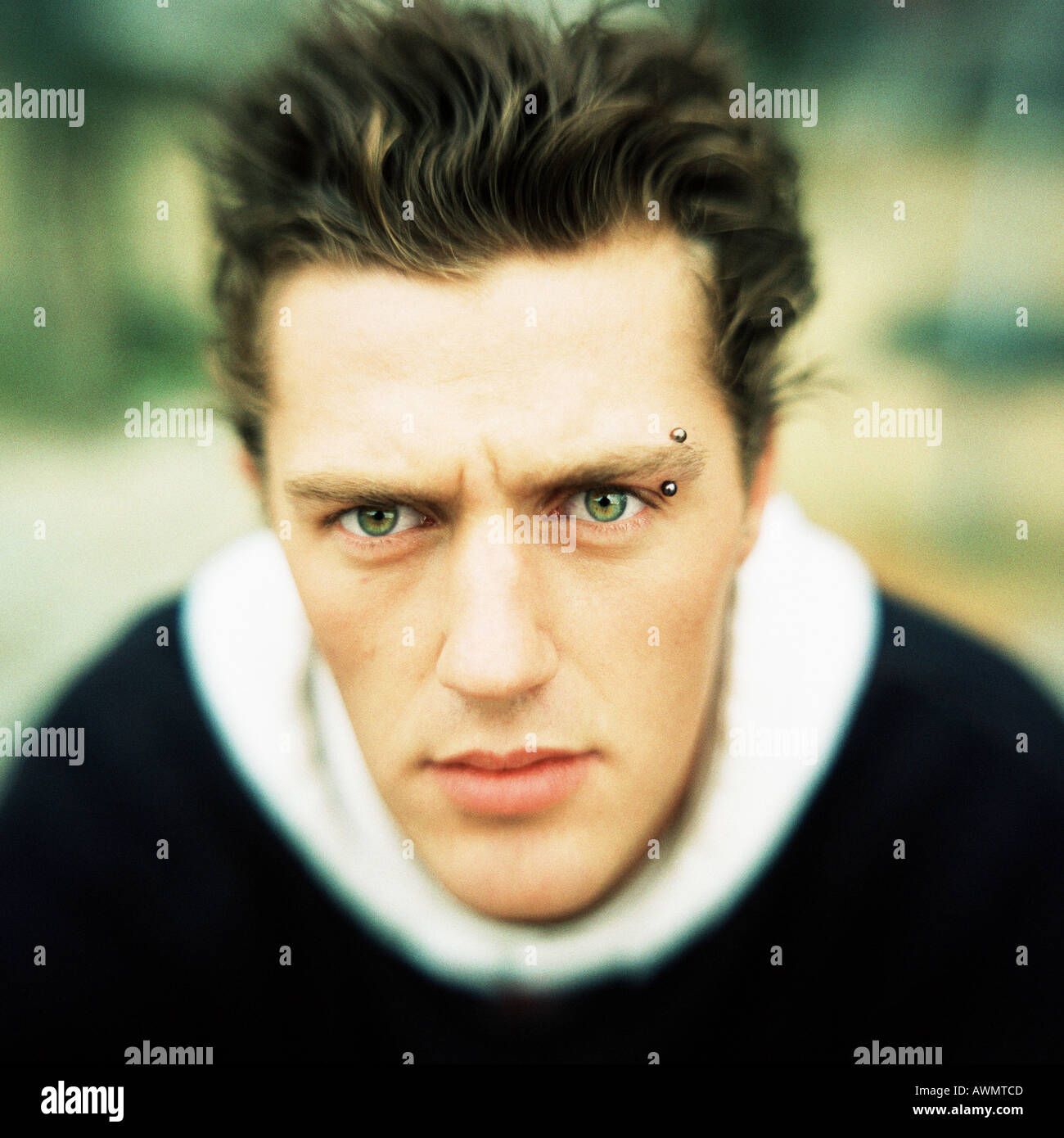 Young man looking at camera, close-up, portrait Stock Photo - Alamy