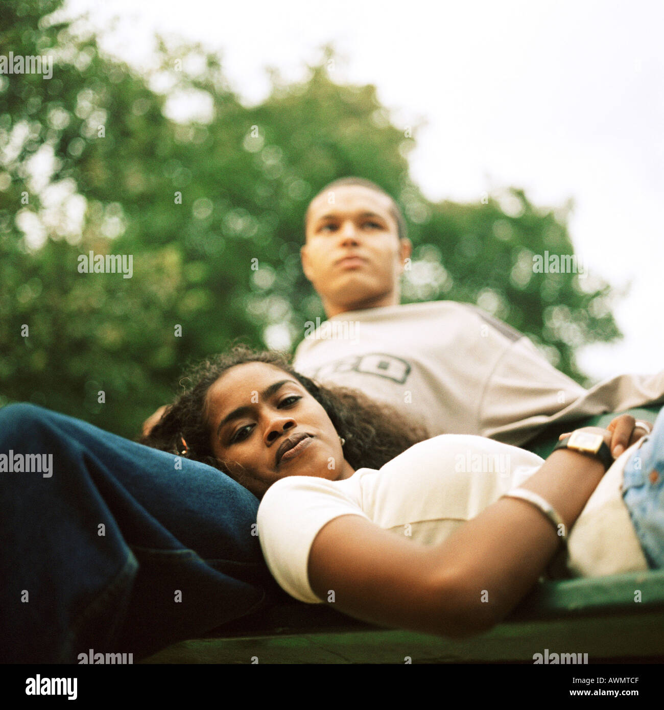 Young woman sitting on mans lap hi-res stock photography and images - Alamy