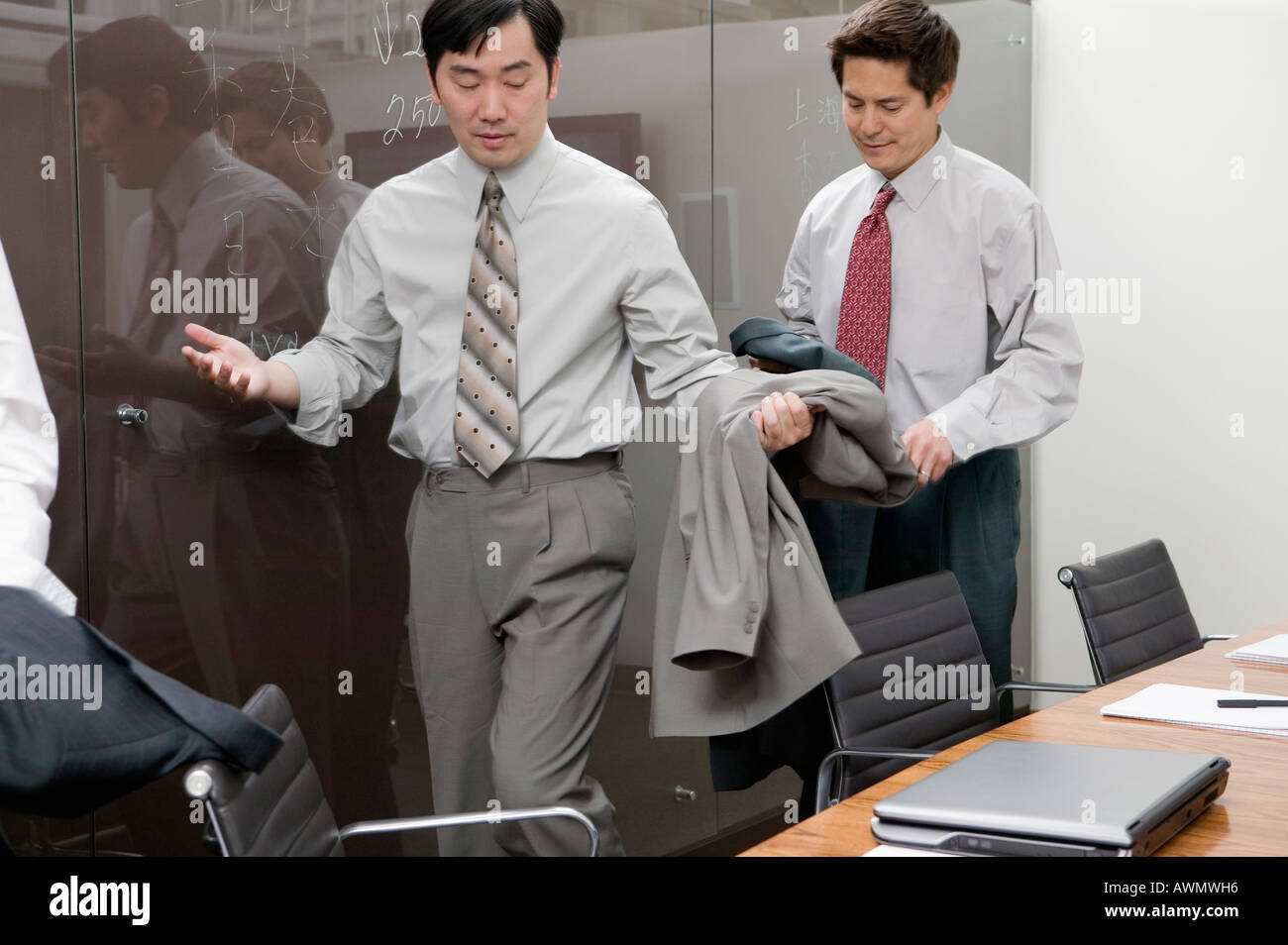 Businessmen leaving office hi-res stock photography and images - Alamy