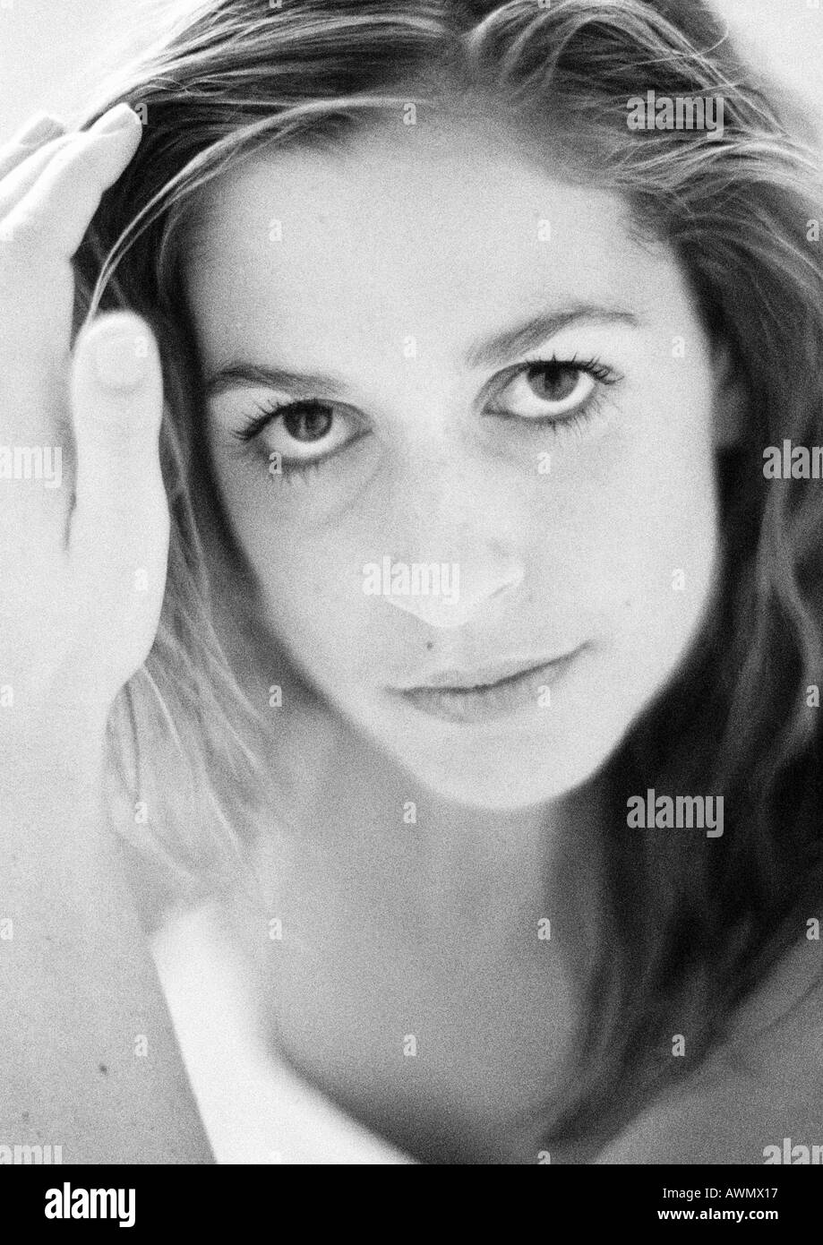Hand touches the head Black and White Stock Photos & Images - Alamy