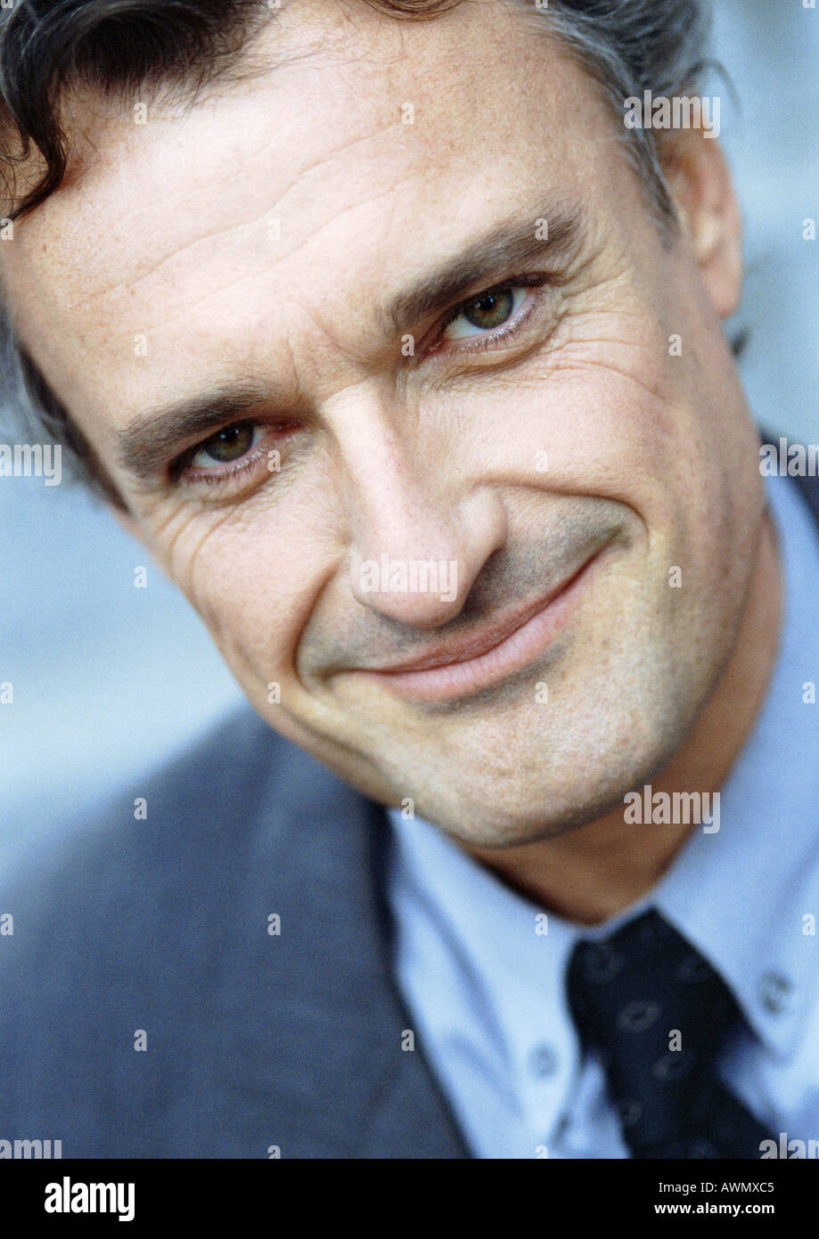 Man in business suit looking at camera, portrait, close-up, tilt Stock ...