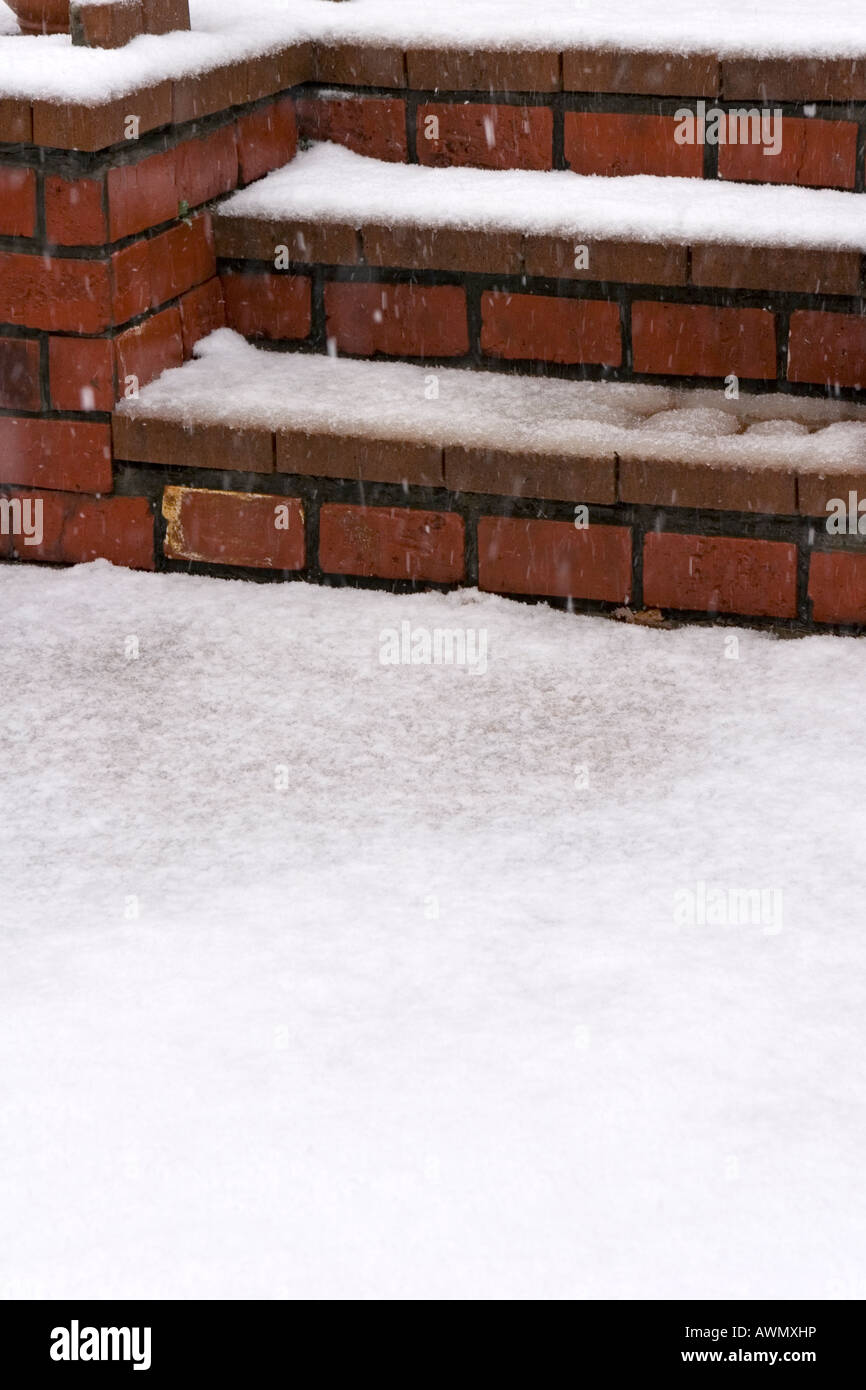 Snow Falling on Brick Steps Stock Photo - Alamy