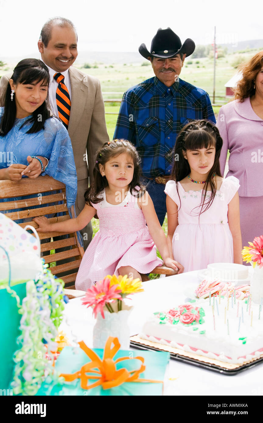 Hispanic family at birthday party Stock Photo - Alamy