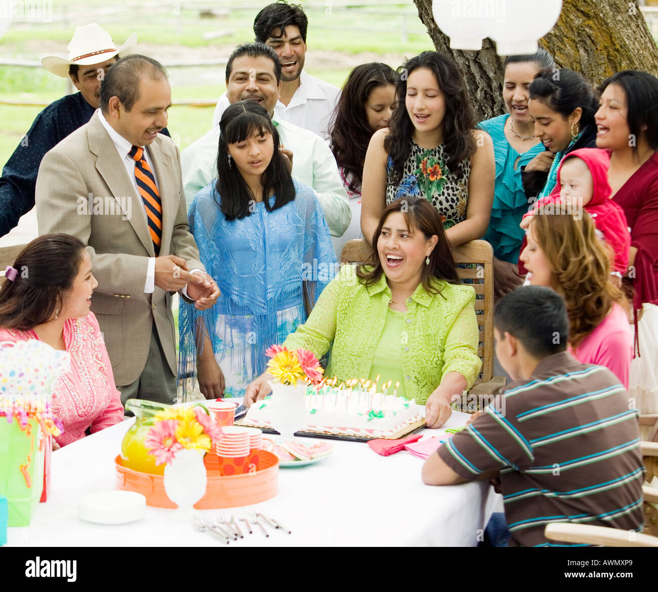 Hispanic family at birthday party Stock Photo - Alamy