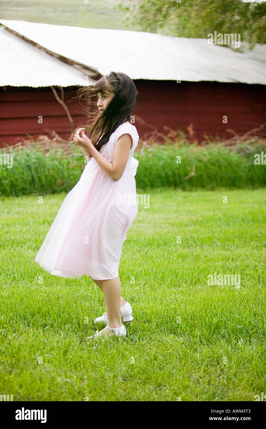 Hispanic girl wearing party dress Stock Photo - Alamy