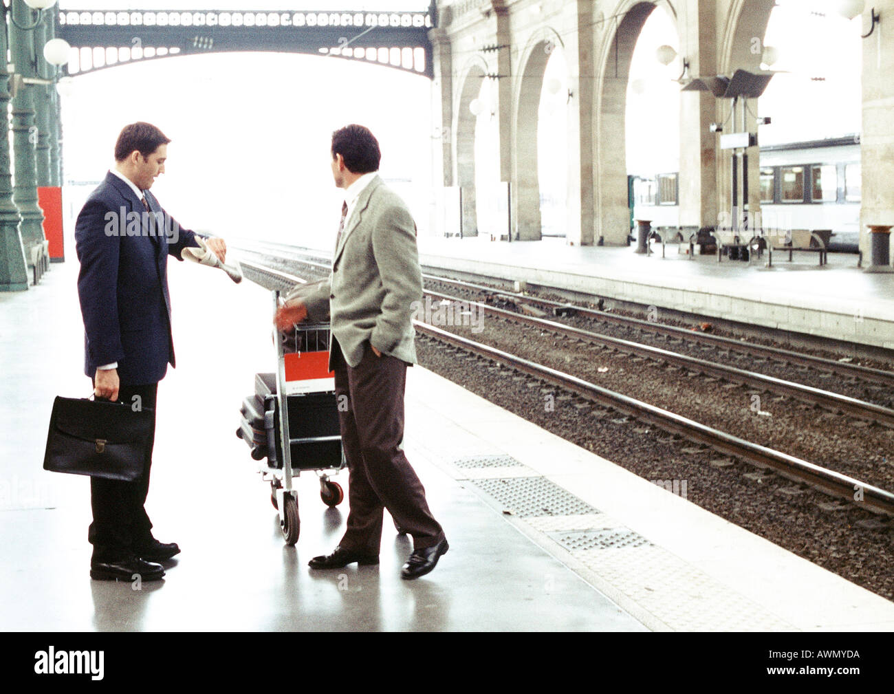 Checking watch and platform hi-res stock photography and images - Alamy