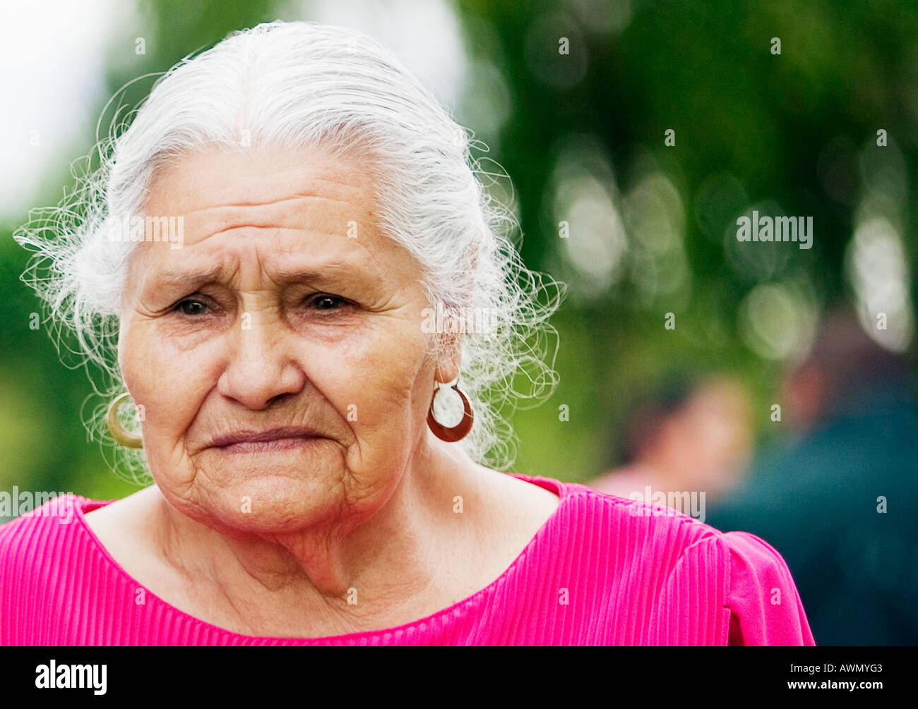 Elderly hispanic woman sad hi-res stock photography and images - Alamy
