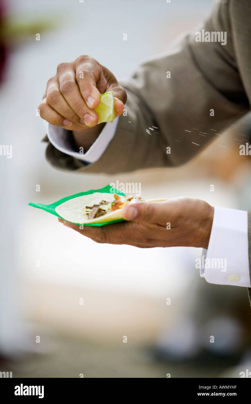 Squeezing fresh lemon on hi-res stock photography and images - Alamy