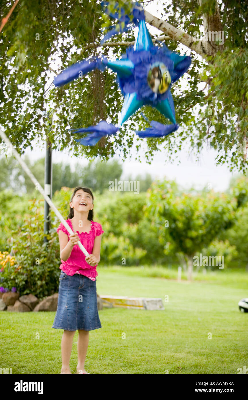 Hitting pinata hi-res stock photography and images - Alamy