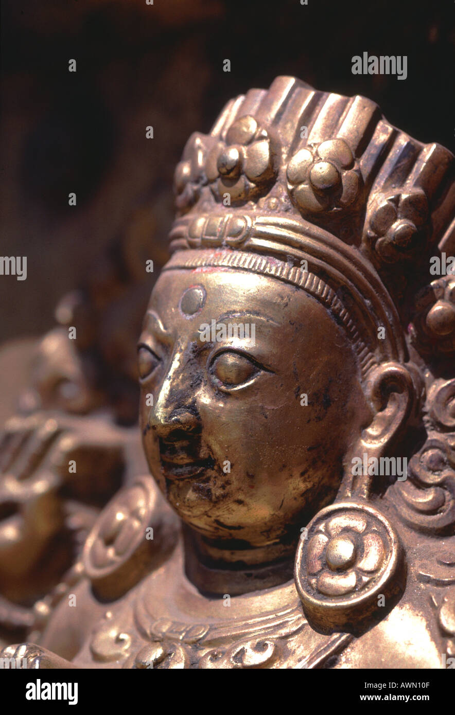 Nepal Bhaktapur figure of deity on golden gate Stock Photo - Alamy