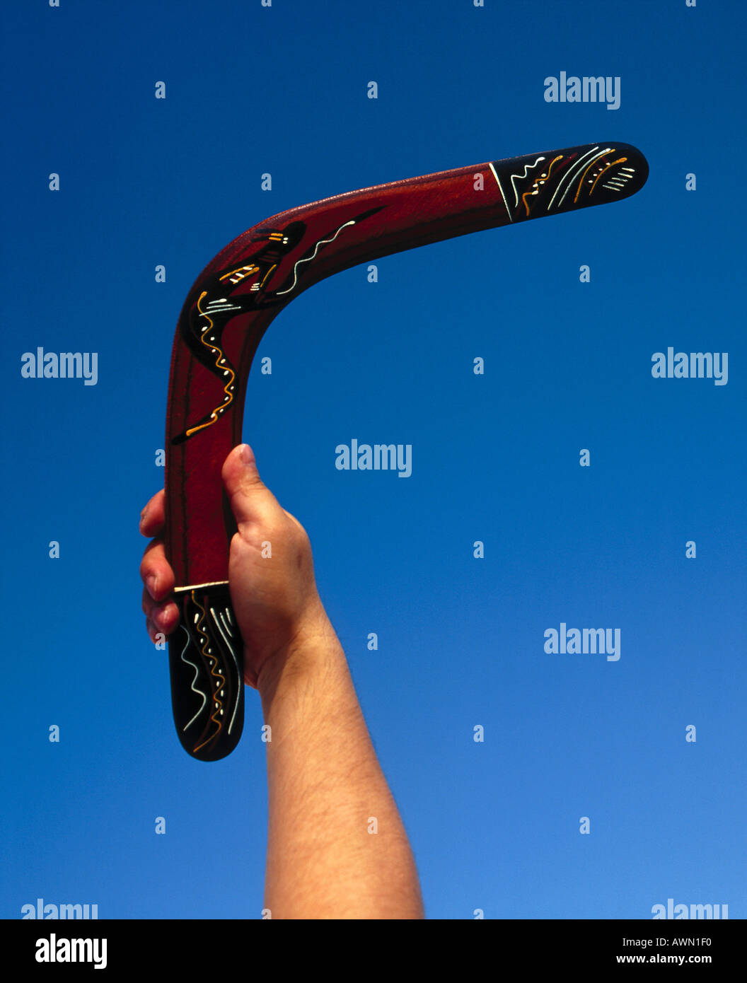 Hand holding boomerang hi-res stock photography and images - Alamy
