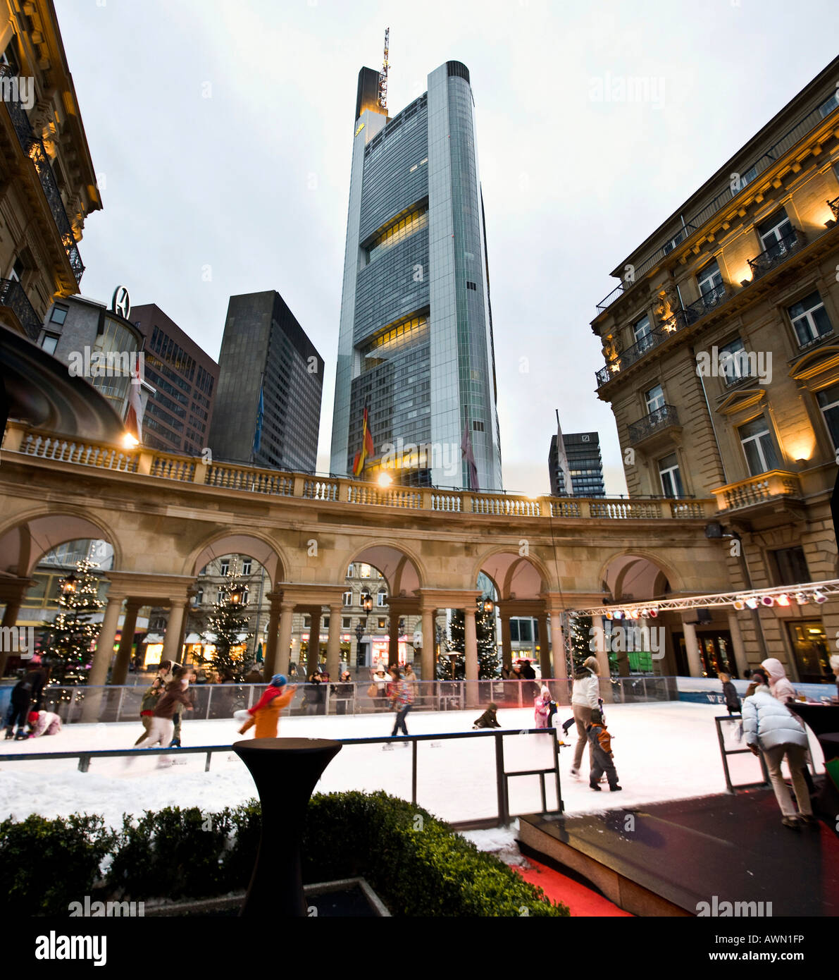 Children skating on artificial rink in the city centre at the ...