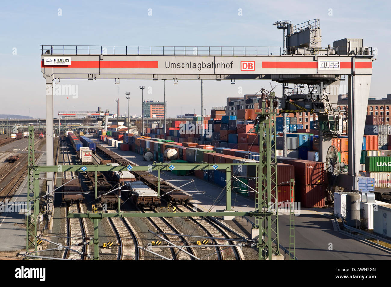 Containers and loading crane at the transshipment rail station in ...