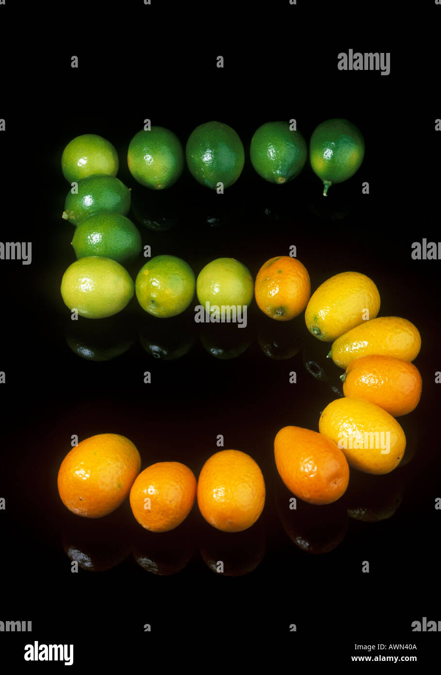 Fruit arranged in the shape of the number five changing in colour from ...