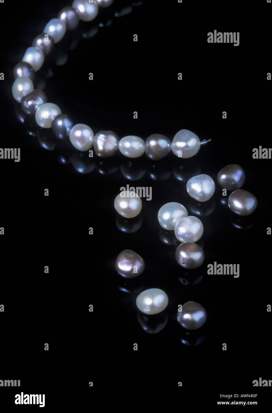 Broken necklace hi-res stock photography and images - Alamy