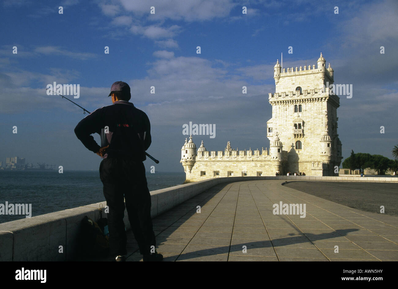 Belem tower. White square stone tower. Sea. Man Stock Photo - Alamy