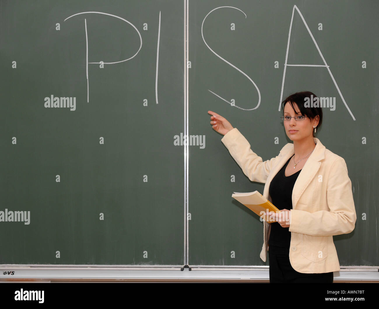 Young female teacher and Programme for International Student Assessment ...