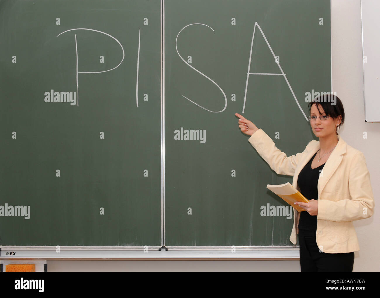 Young female teacher and Programme for International Student Assessment ...