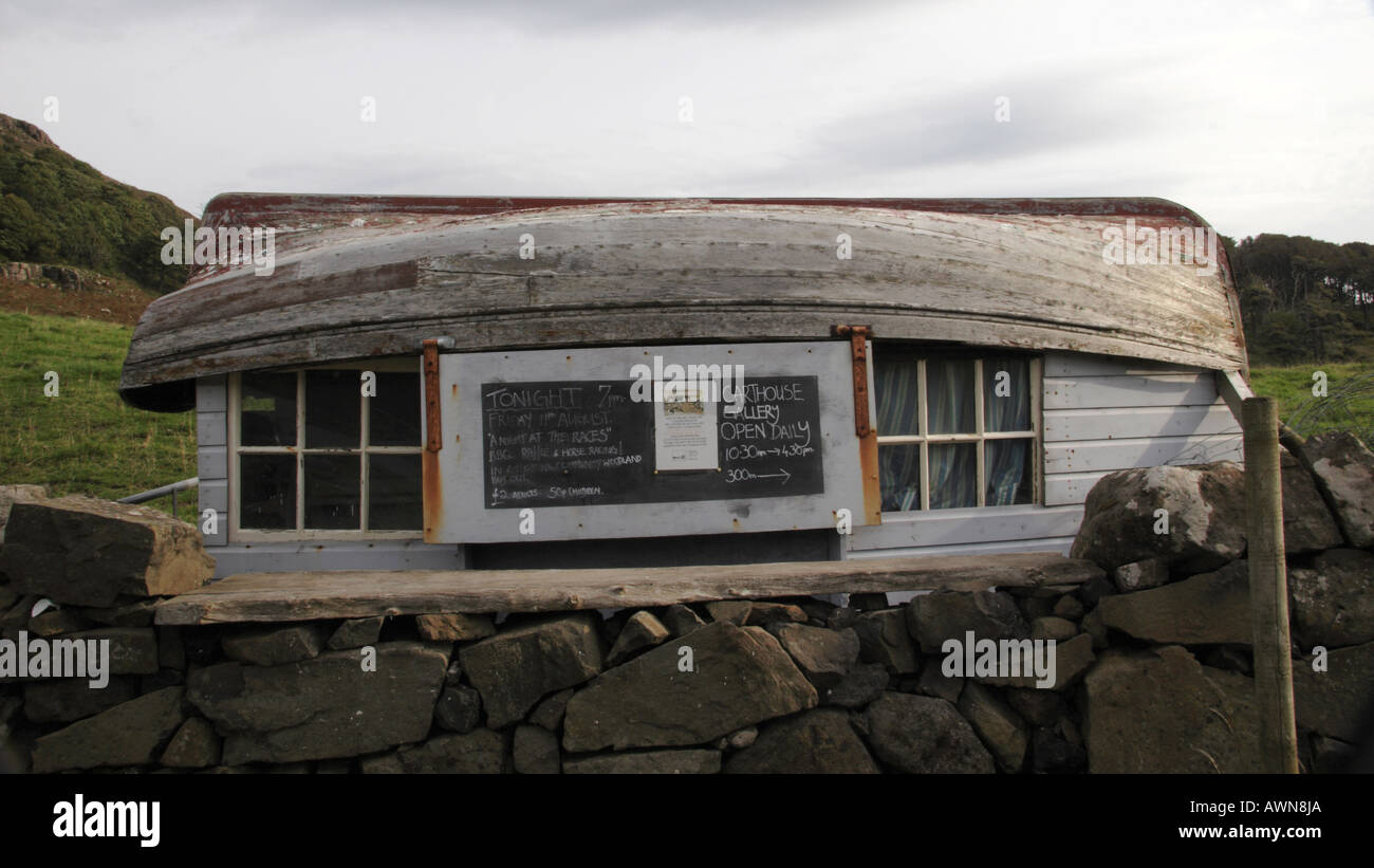 A hut with an inverted boat as its roof Stock Photo - Alamy