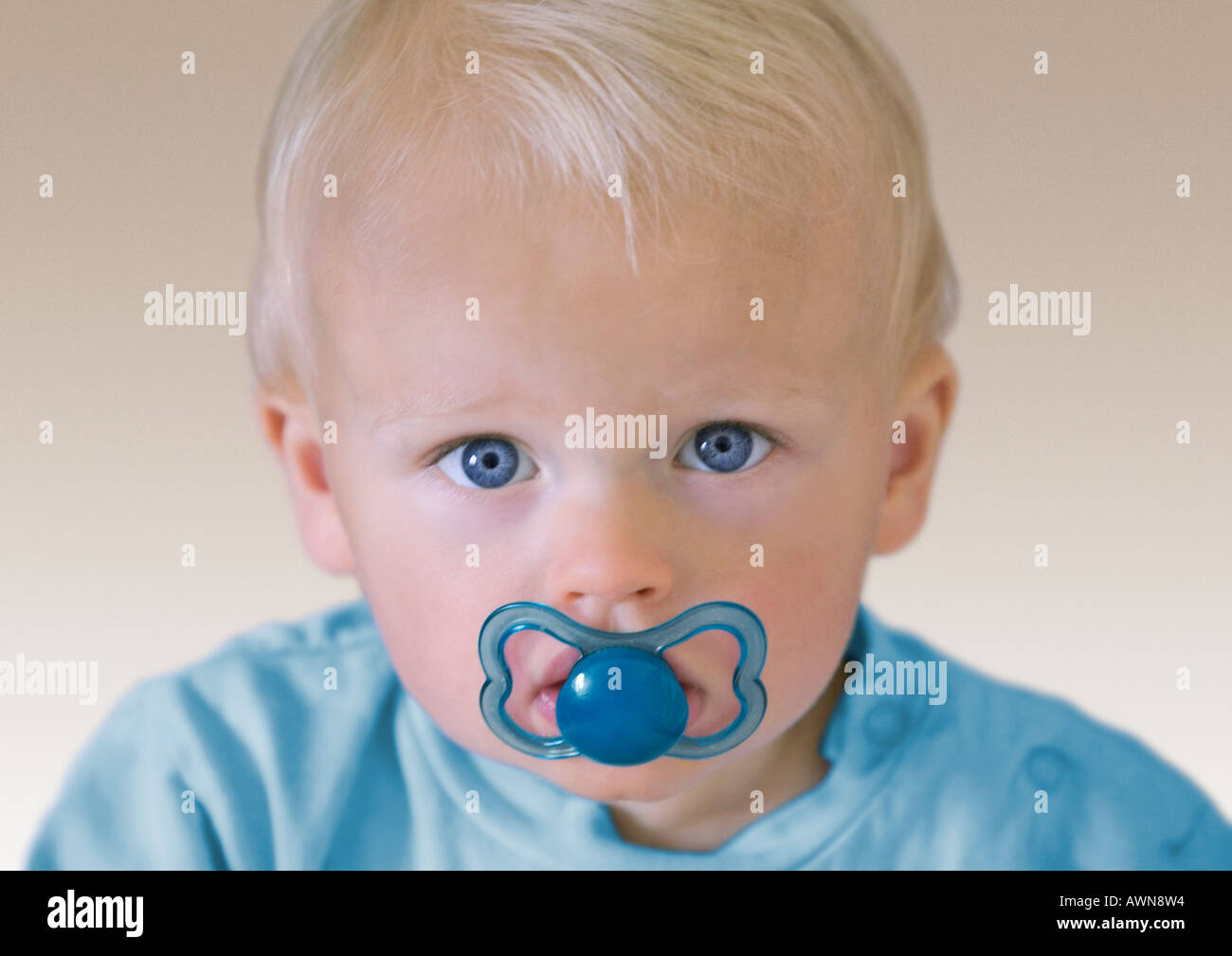 Baby boy with intense eyes hi-res stock photography and images - Alamy