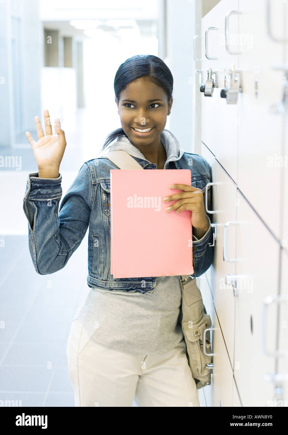 Girl leaning against lockers hi-res stock photography and images - Alamy